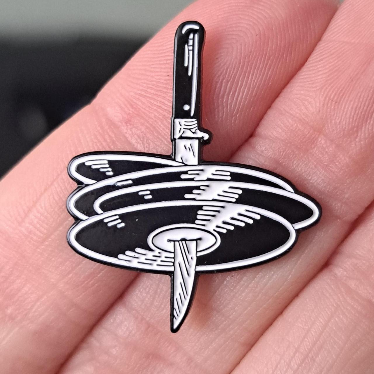 Enamel pin badge. Enamel on black metal with black... - Depop