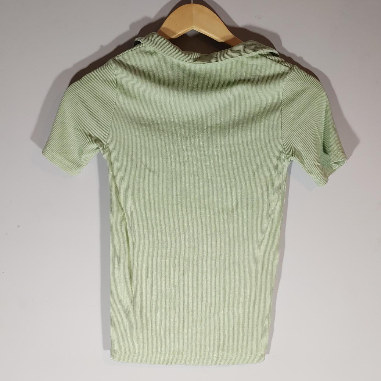 Light green/mint t-shirt with collar A ribbed,... - Depop