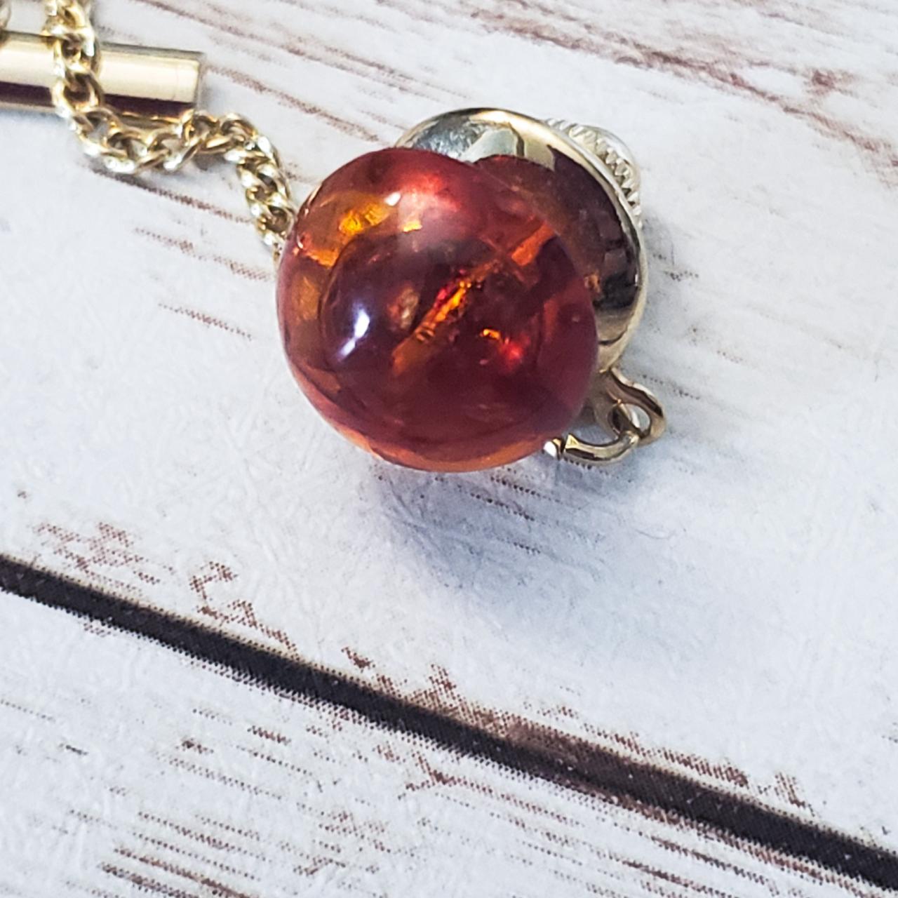 Vintage Tie Tack Amber Tone Ball Light marks. Sold... - Depop