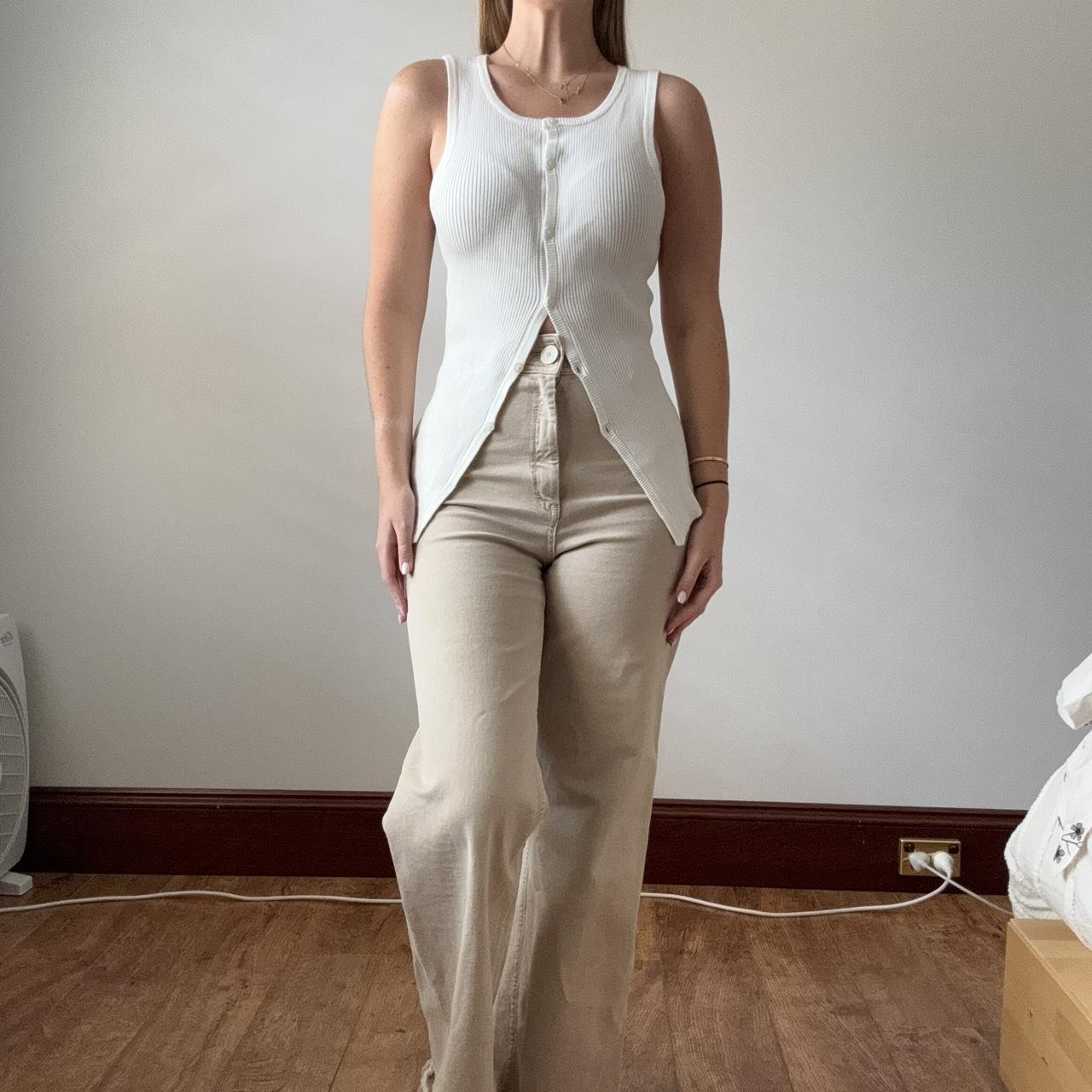 Soft knit button down vest top. Never been worn, new... - Depop