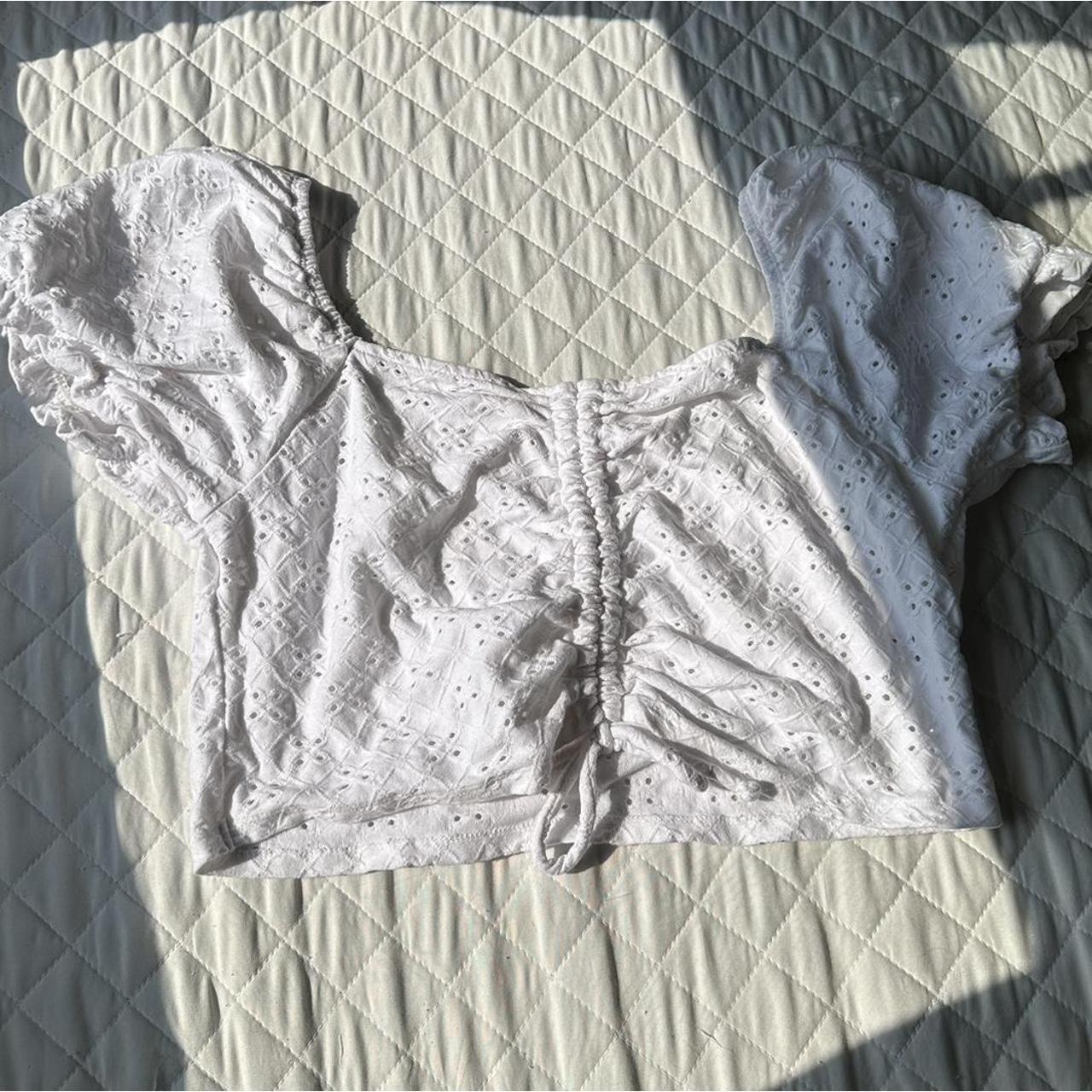 white top with poofy short sleeves stretchy - Depop