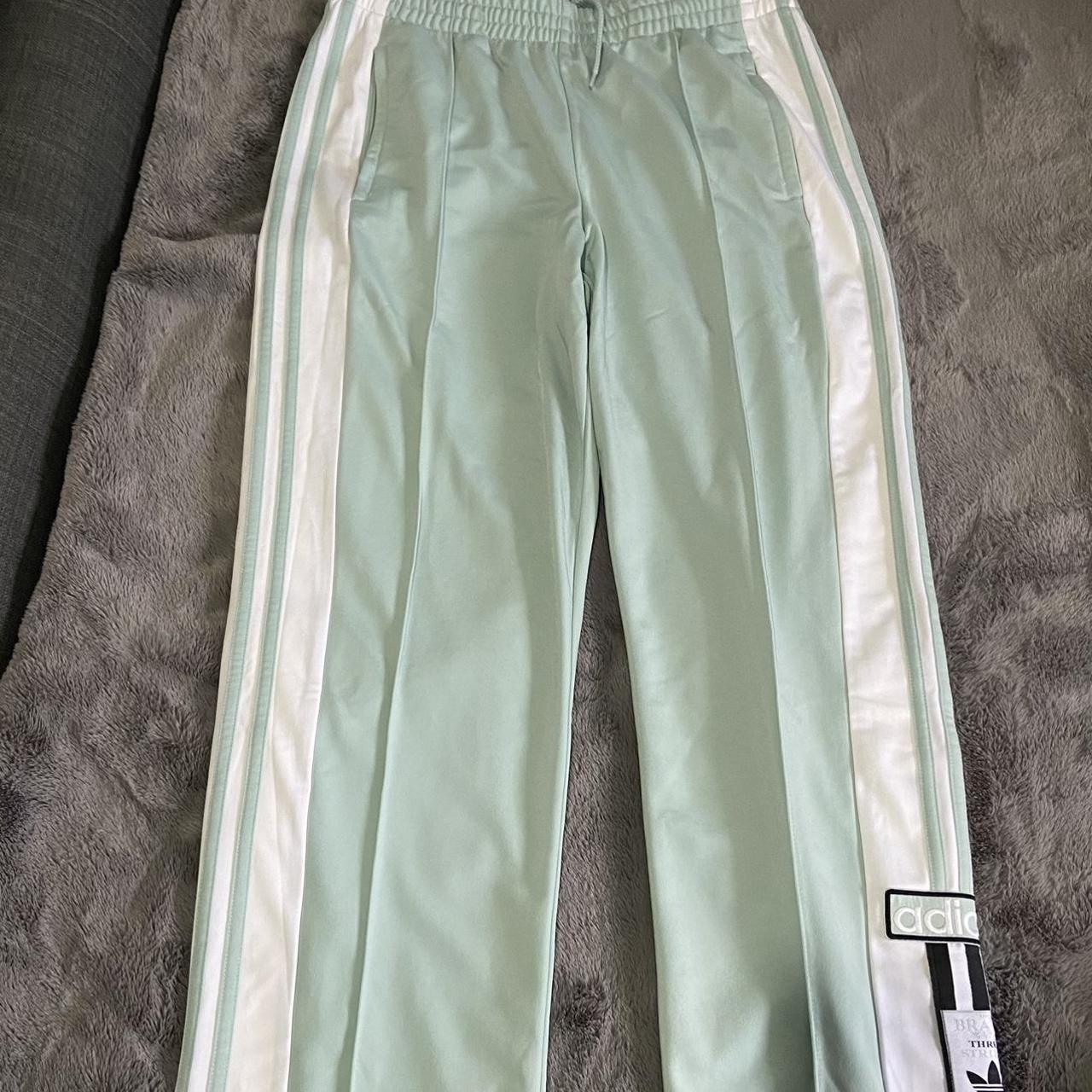 mint green Adidas track pants - Depop