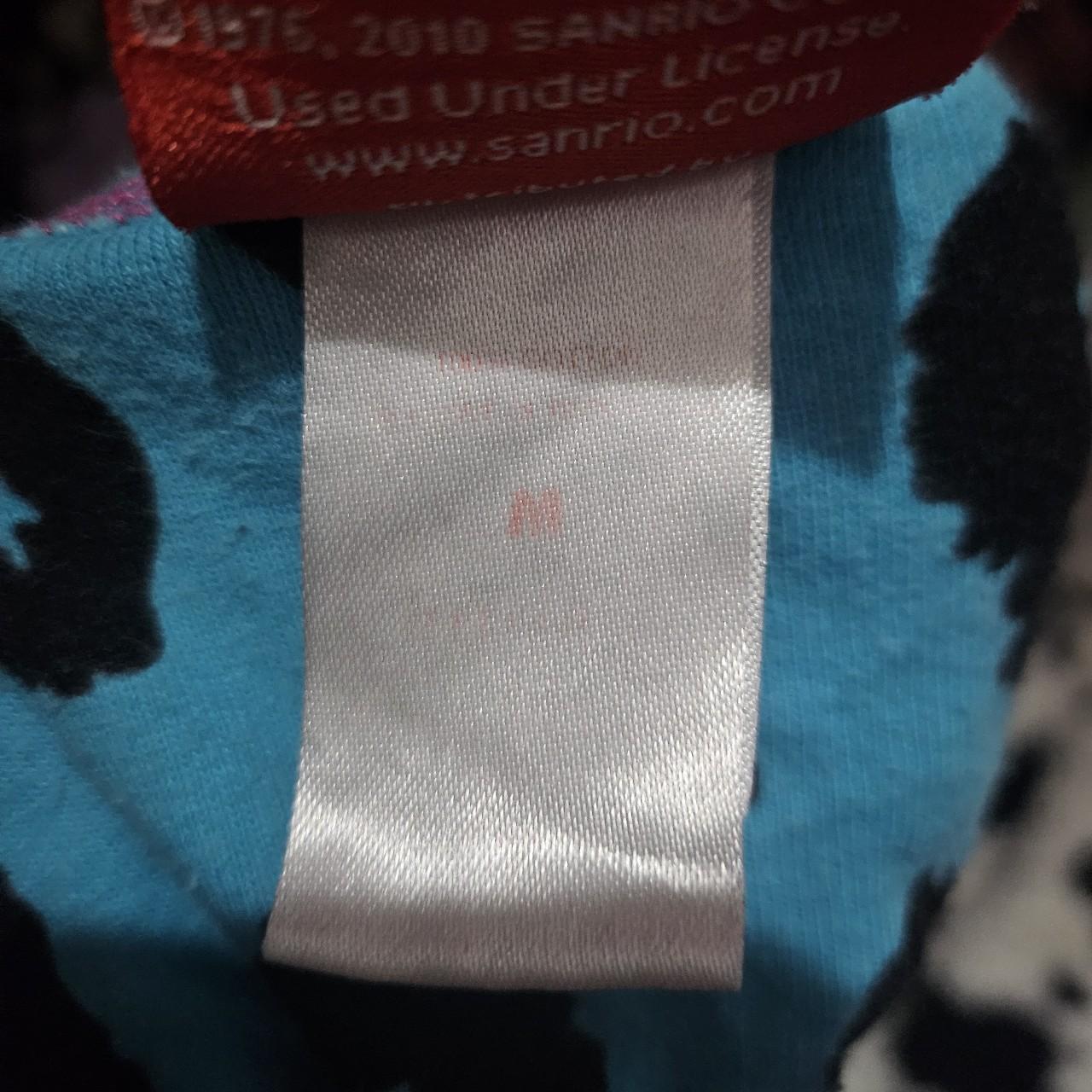 Vintage blue cheetah print hello kitty tank top. In... | Depop