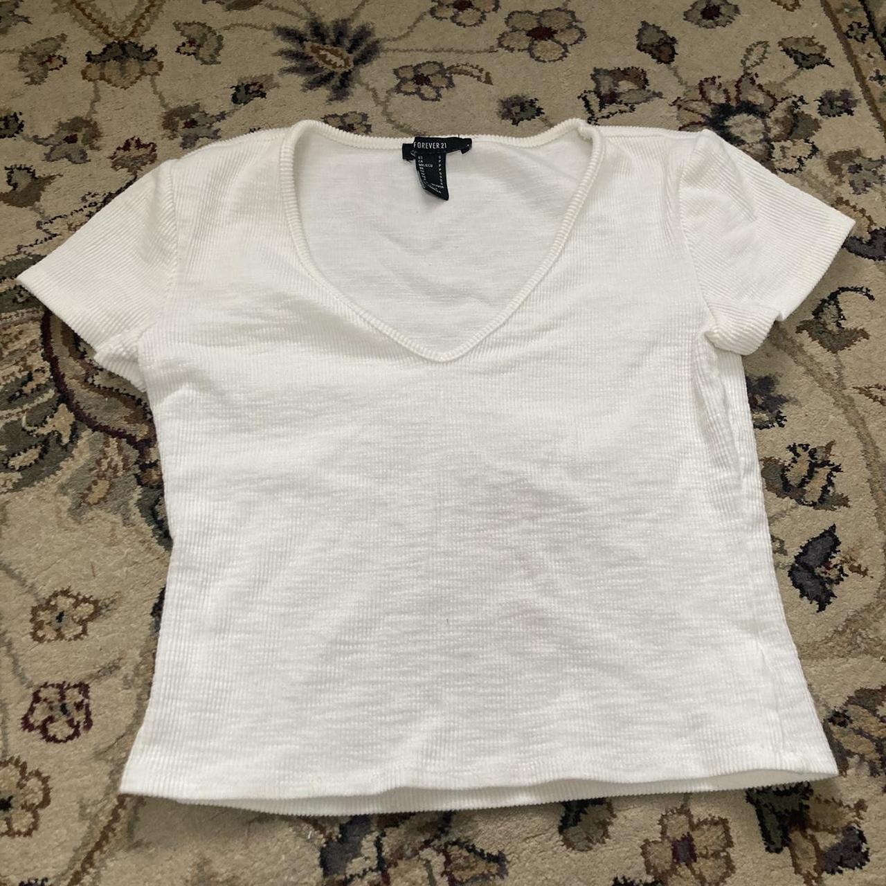 Forever 21 white ribbed v neck top. Size small - Depop