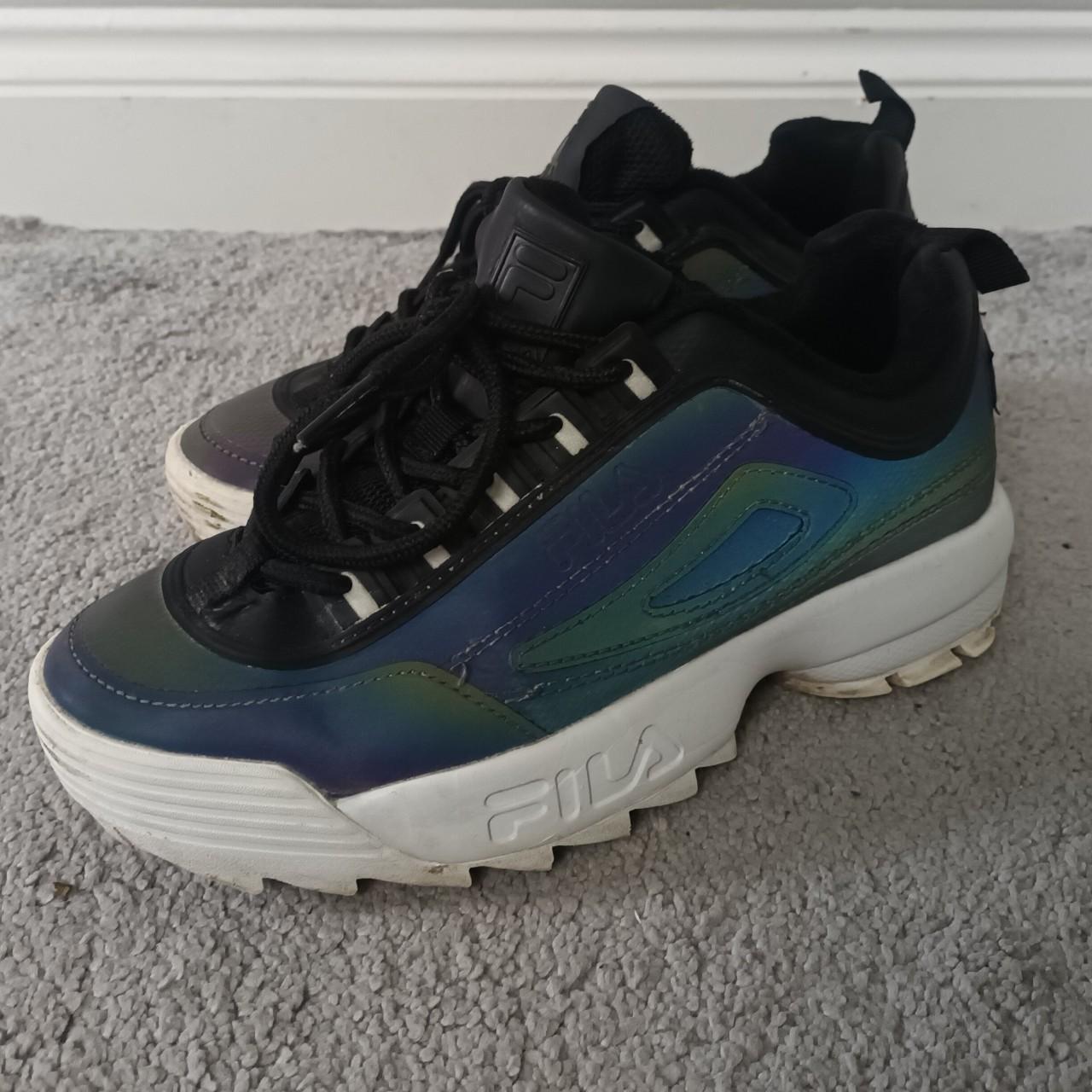 Fila Women's Black and Silver Trainers | Depop