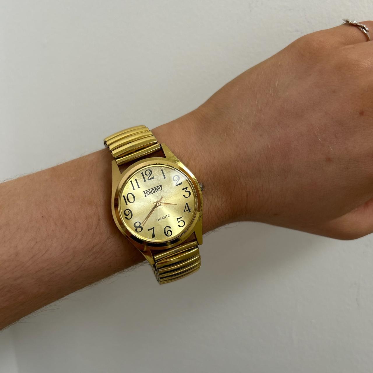 Featurely gold quartz battery watch, elastic gold... | Depop