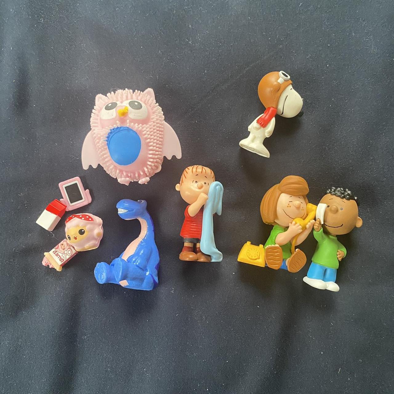 Random toys lot snoopy peanuts dinosaur vinyl... - Depop