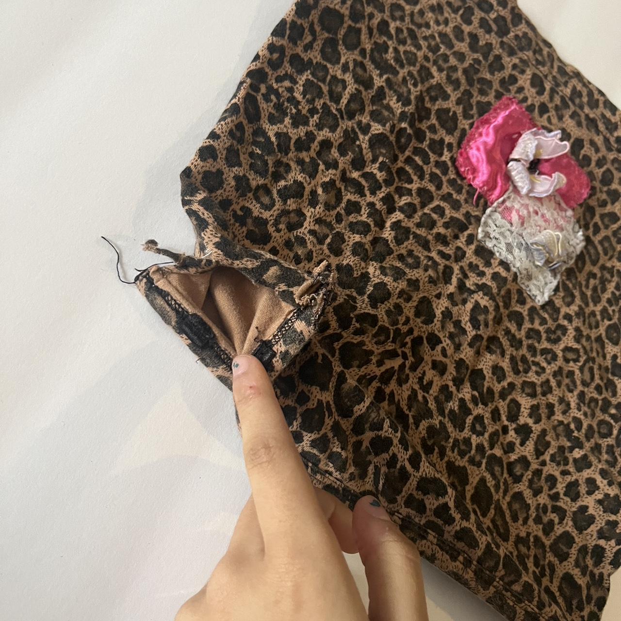 Butterfly tube top little rip on the side, not... - Depop