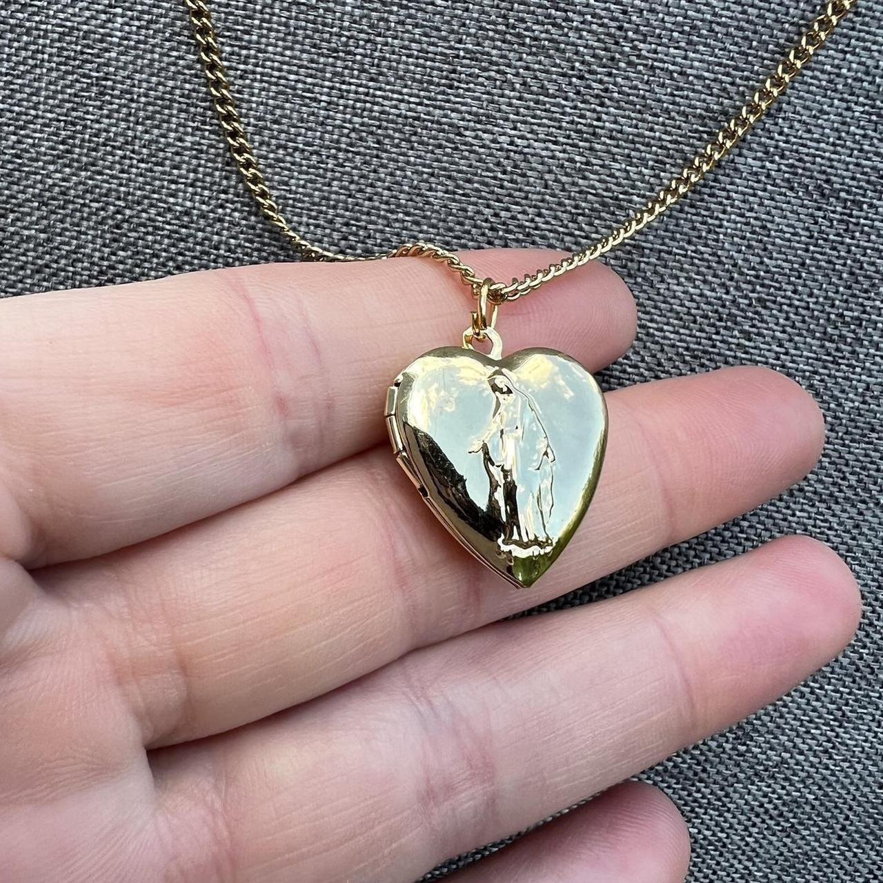 18kg Plated Dainty Virgin Mary Golden Heart Locket... - Depop
