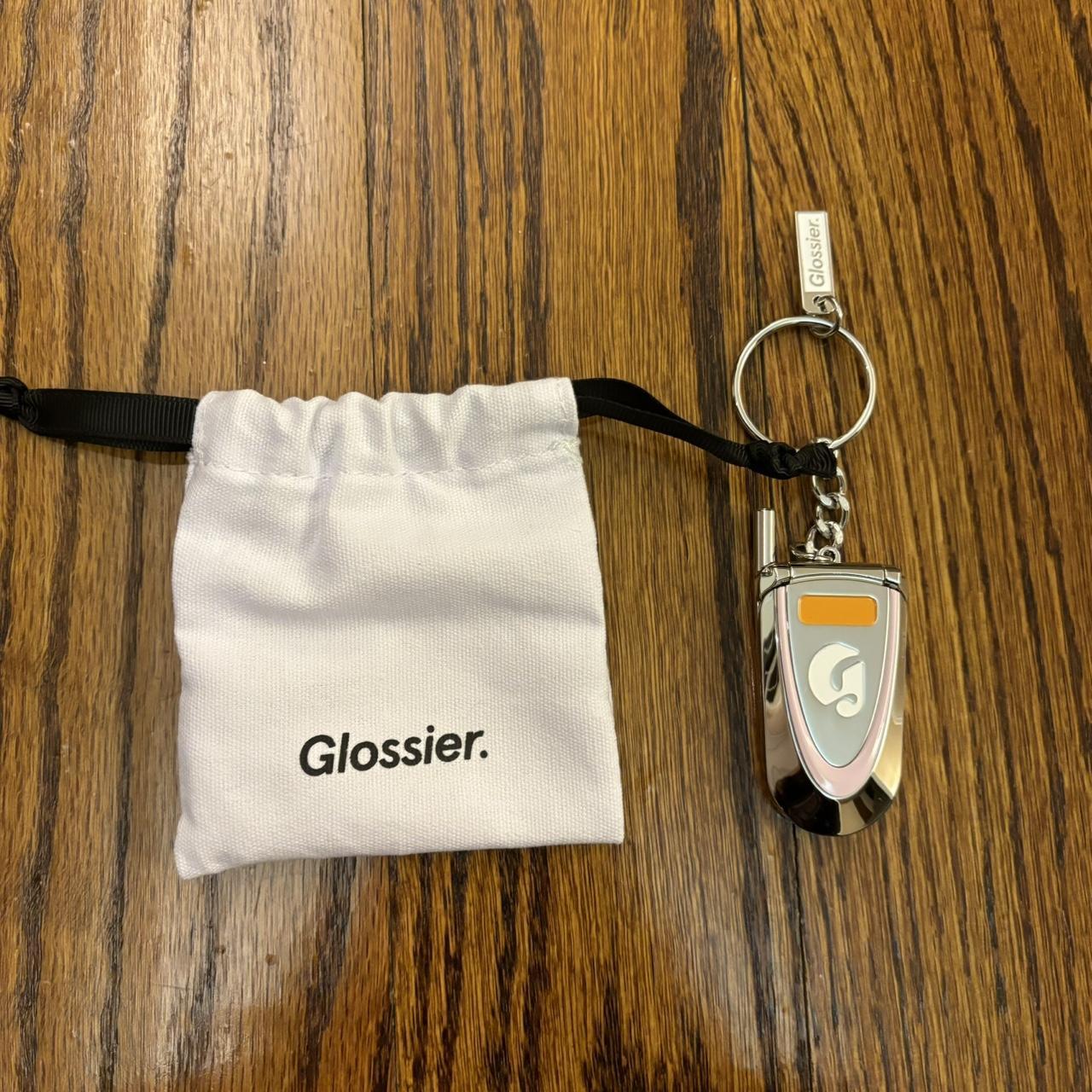 Glossier phone keychain in pink and silver Brand... | Depop