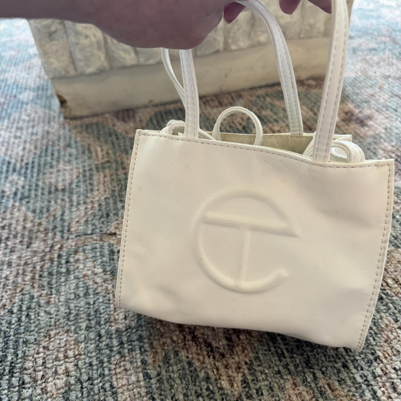 White telfar mini with a small ink stain on the back - Depop