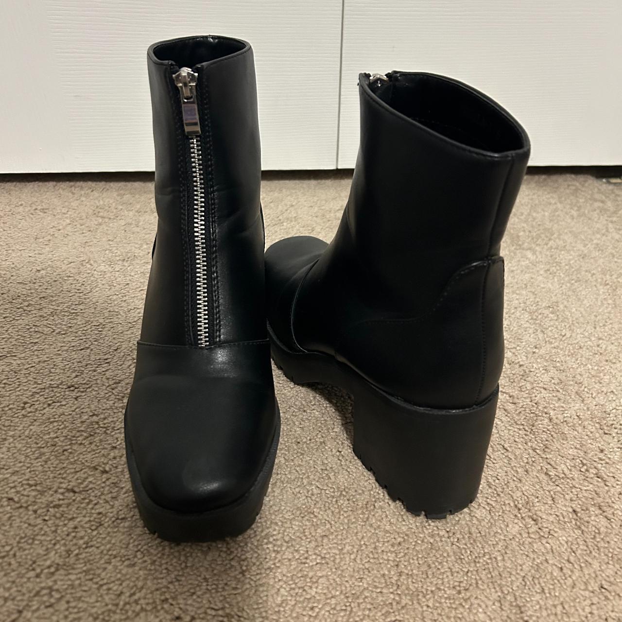 Chunky front zip faux leather boots from ASOS's RAID... - Depop