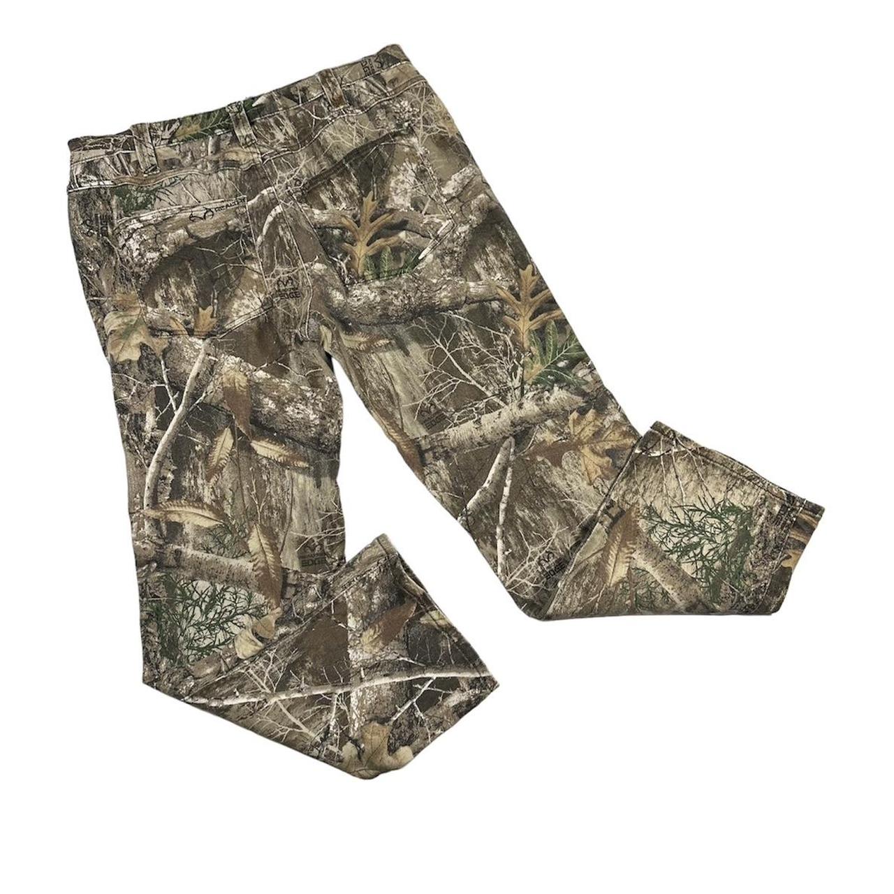 Realtree camo pants with a brown and green colour... - Depop