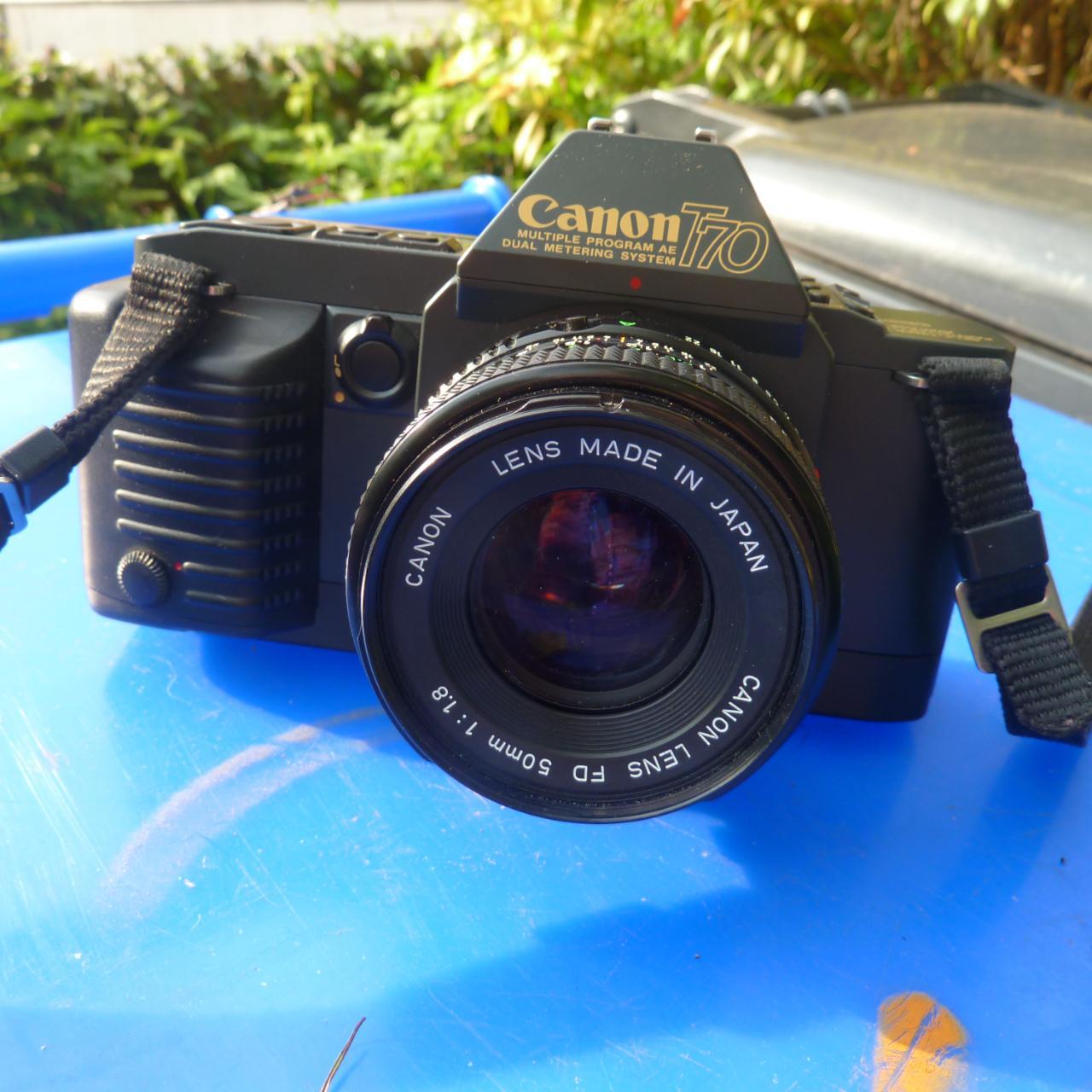 Canon T70 FILM CAMERA COMPLETE WITH LENS AND LENS... | Depop