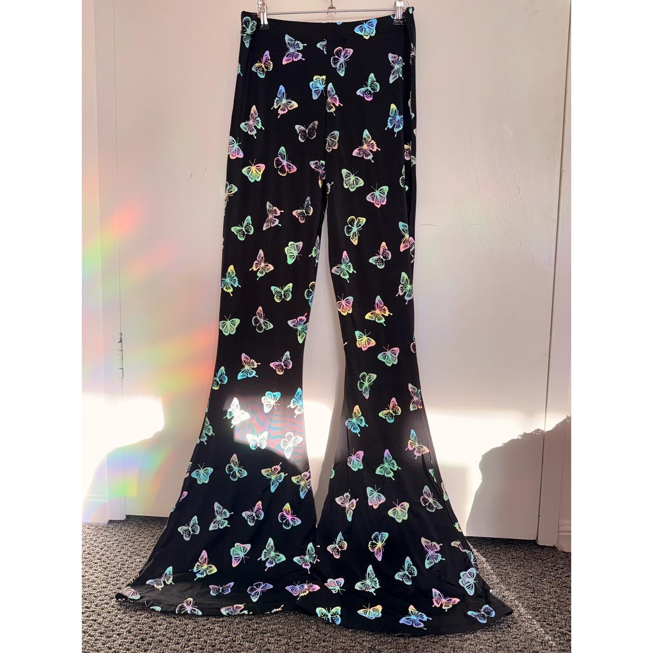 The Volt reflective/holographic butterfly flare... | Depop