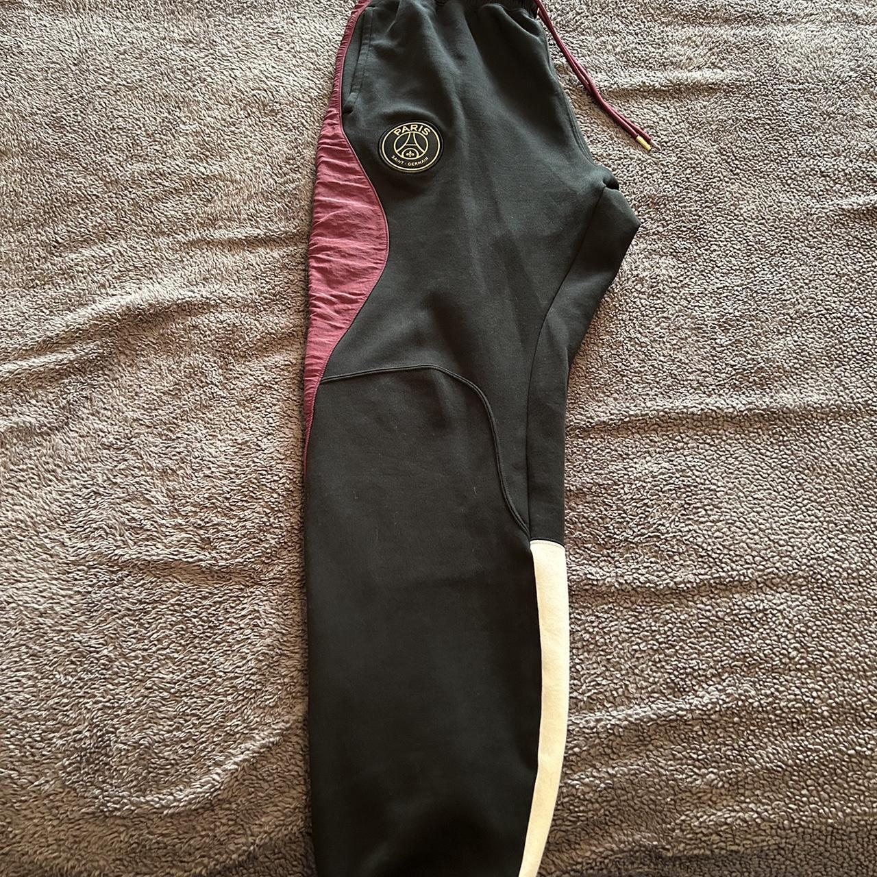 PSG x Jordan off field tracksuit bottoms with gold... - Depop