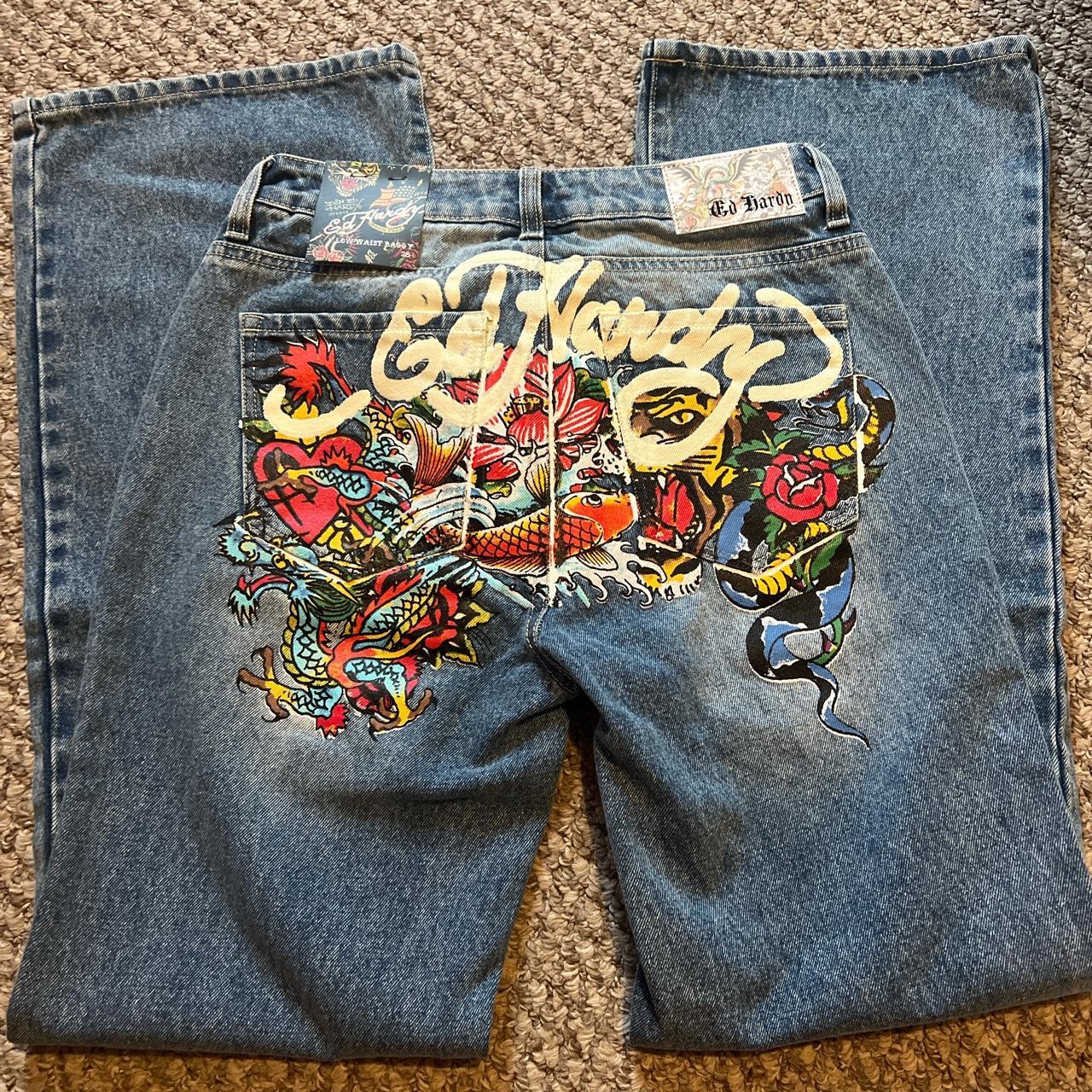 Ed Hardy low waist baggy multi tattoo jeans... - Depop