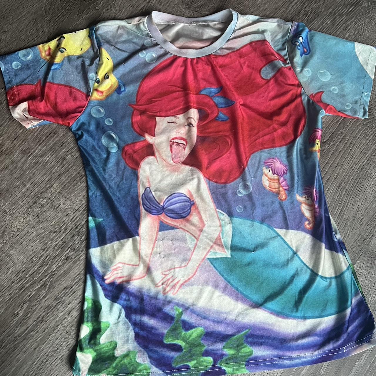 Miley Cyrus as the Little Mermaid on the front and... - Depop