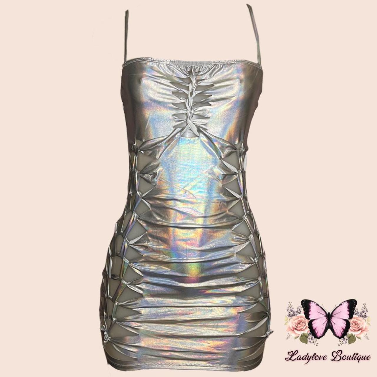 Silver holographic mini dress with weaving detail.... - Depop