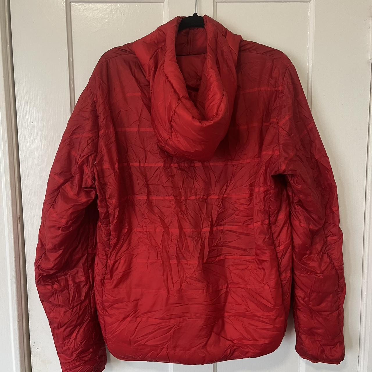 Uniqlo red puffer jacket. Fluffs up very nicely... - Depop