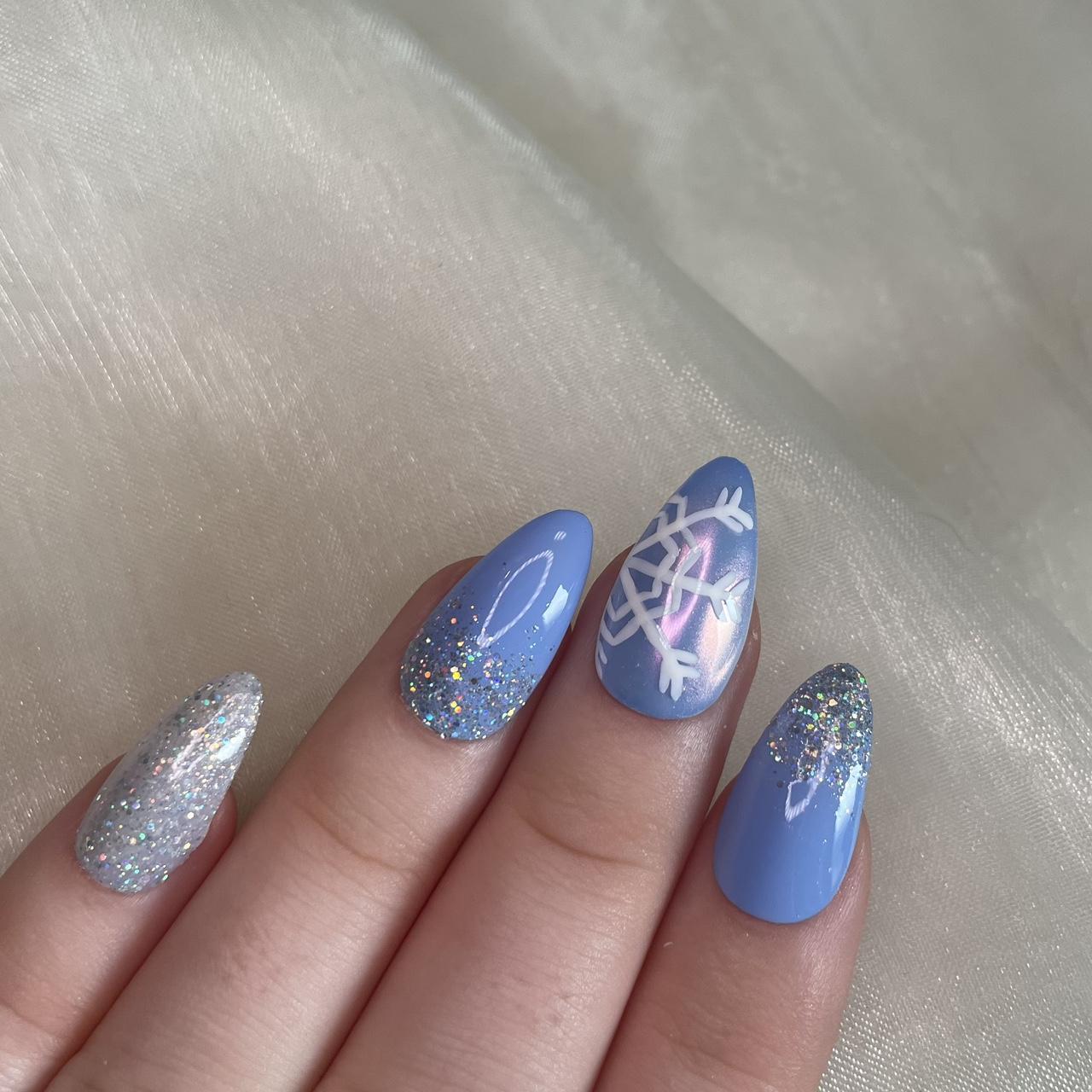 Baby blue almond nails with snowflake design and. Depop