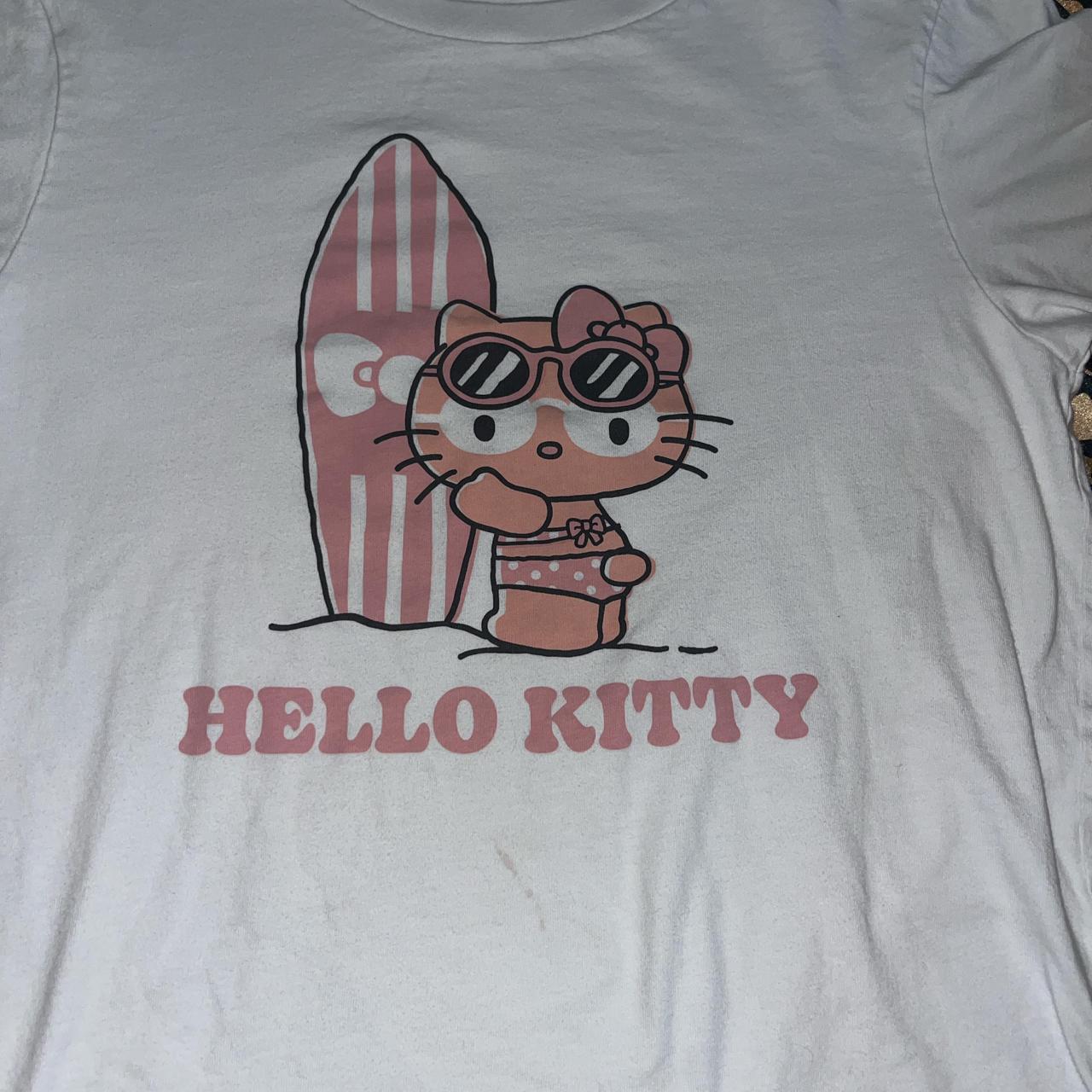 Super cute sunburnt hello kitty beach tee!! In good... | Depop