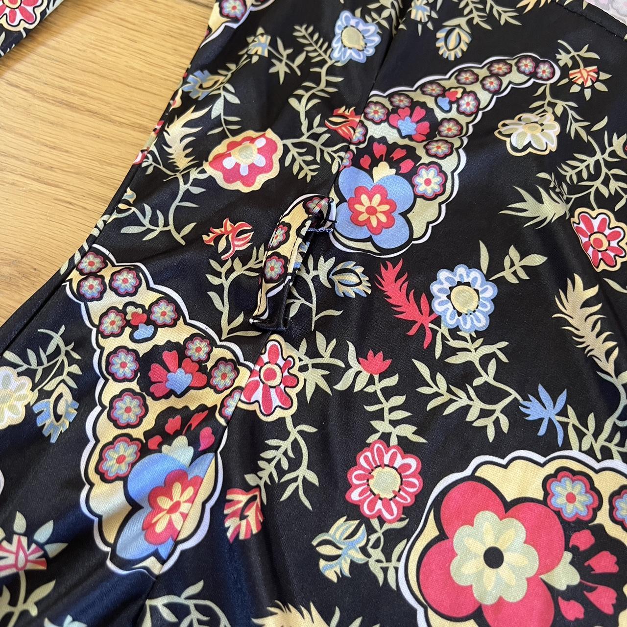 Woman’s small black multi coloured pattern flares... - Depop
