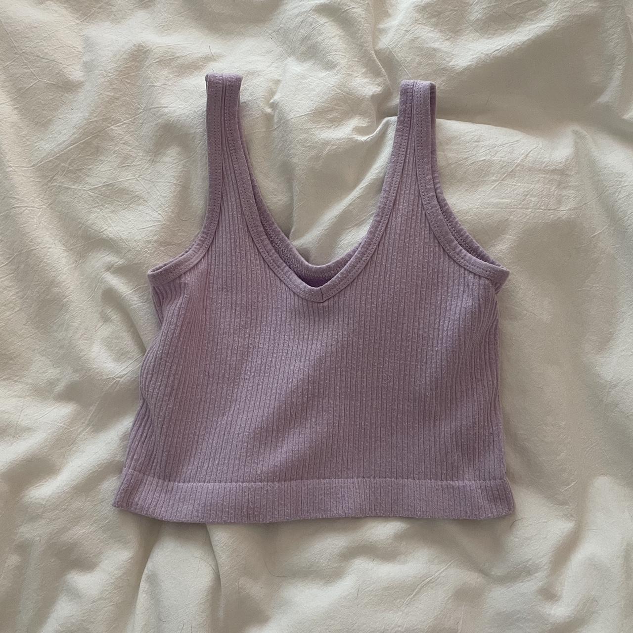 out from under ribbed tank top! so comfy and... - Depop