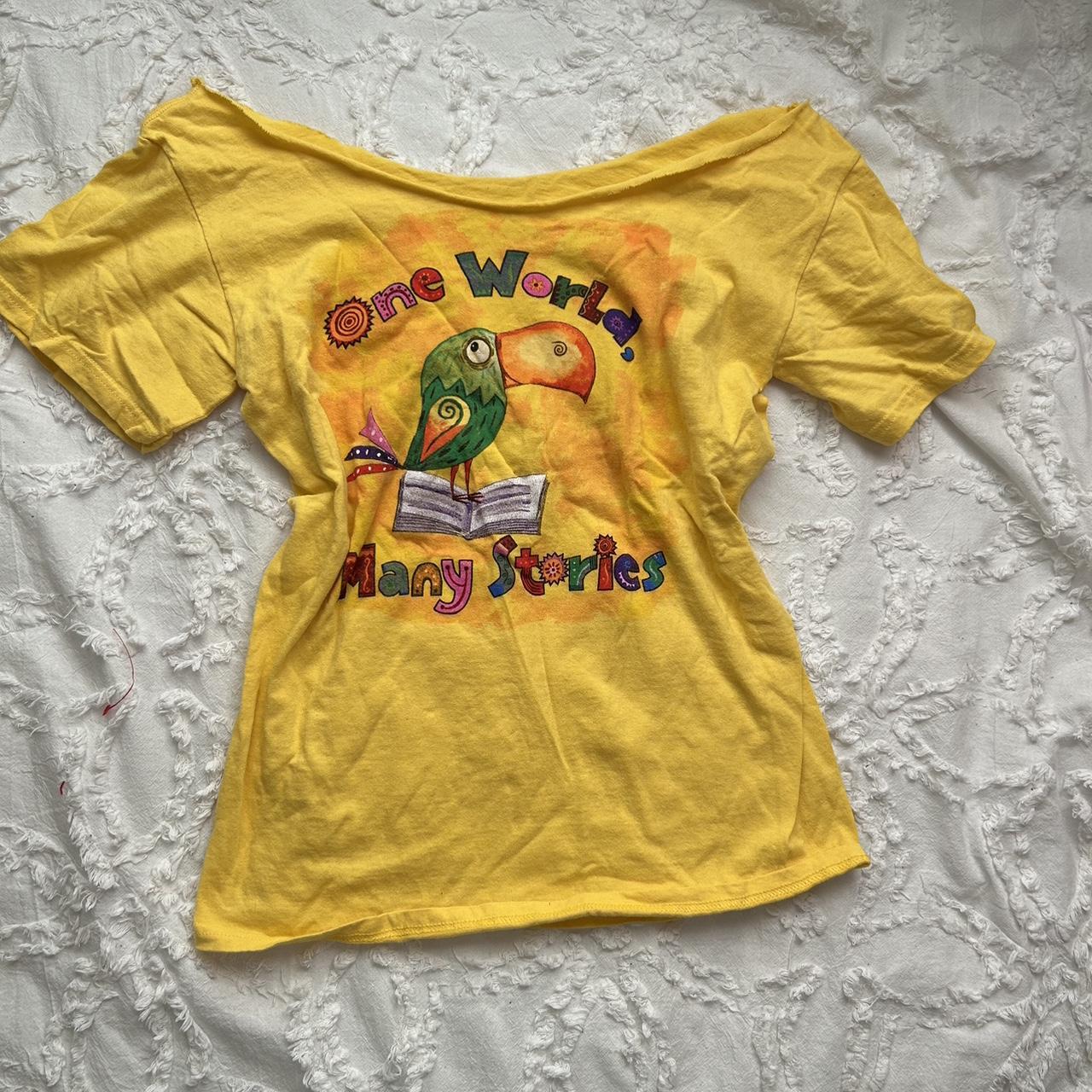 Yellow "One World, Many Stories" shirt, cut to be... - Depop