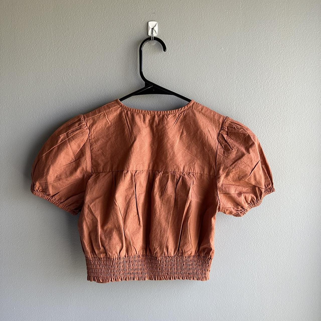 Rust cropped button up top. Cinched at the sleeves... - Depop