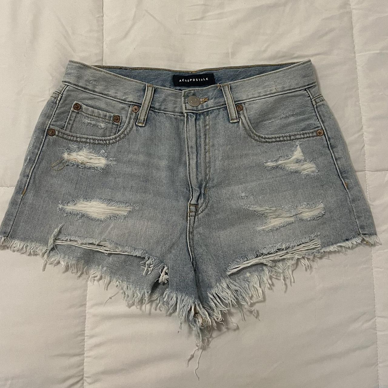 high rise shorty shorts Light wash Distressed... - Depop