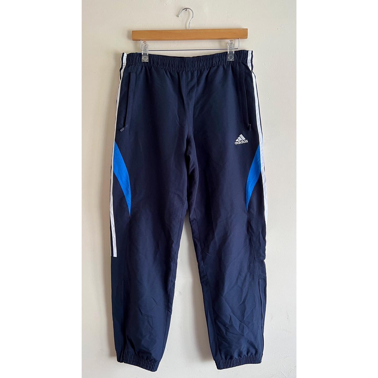 Adidas navy blue sweatpants with side white stripe 🥏 - Depop