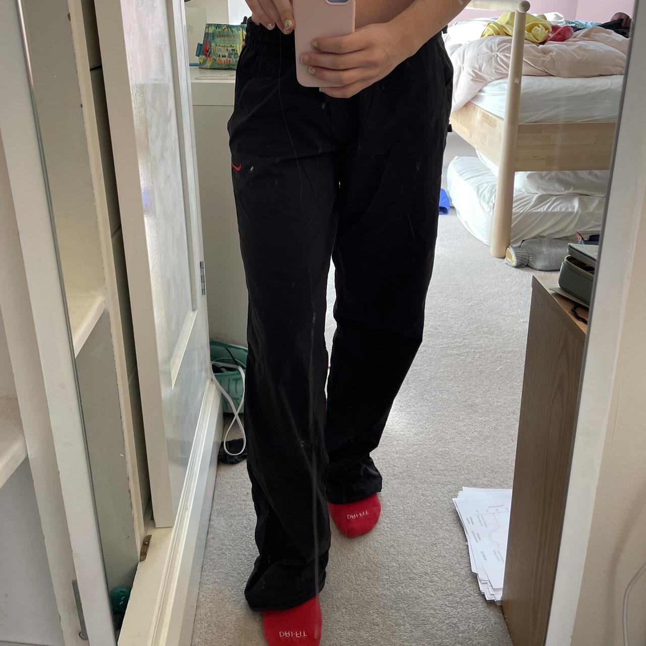 Super cool black low rise Nike trackies with red... - Depop