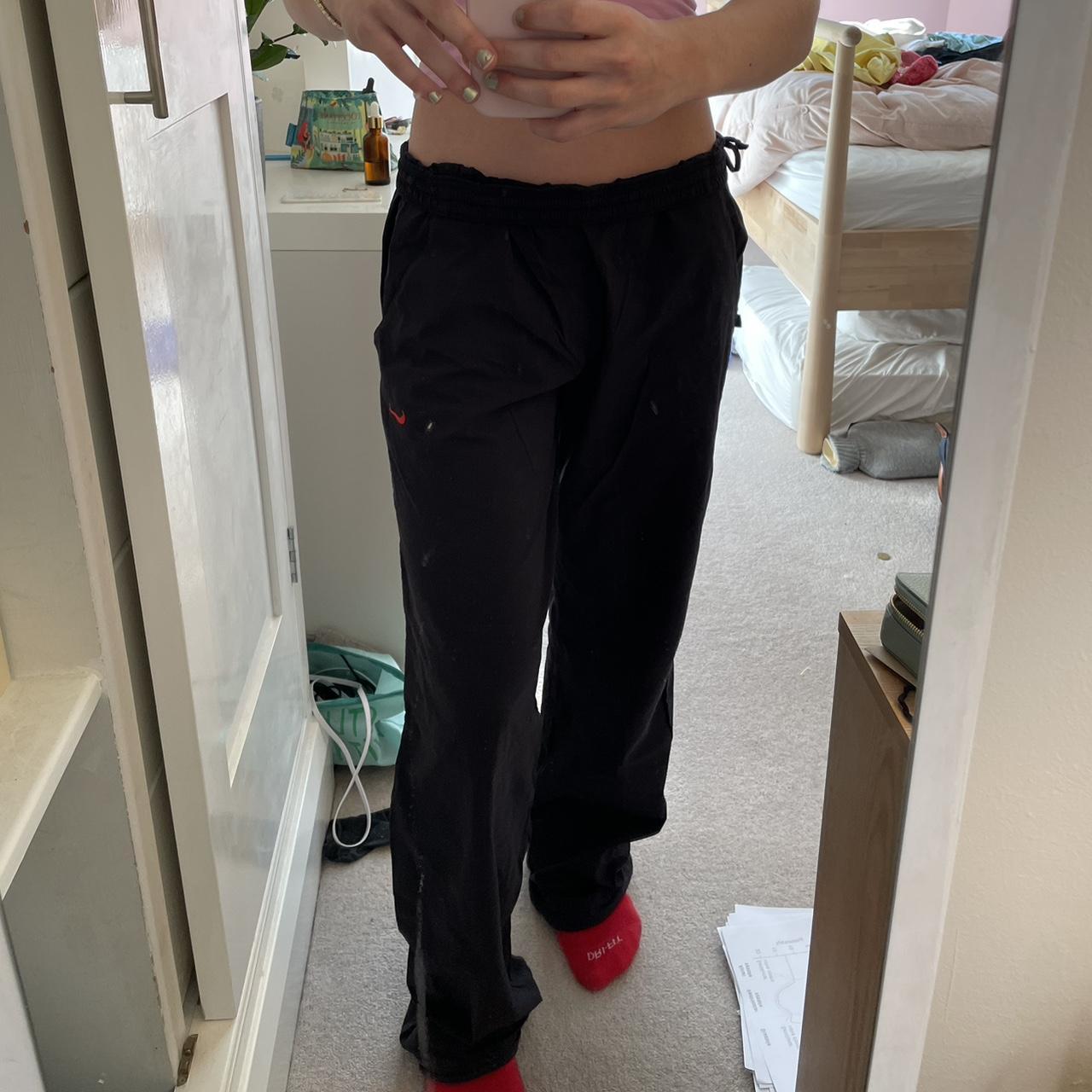 Super cool black low rise Nike trackies with red... - Depop
