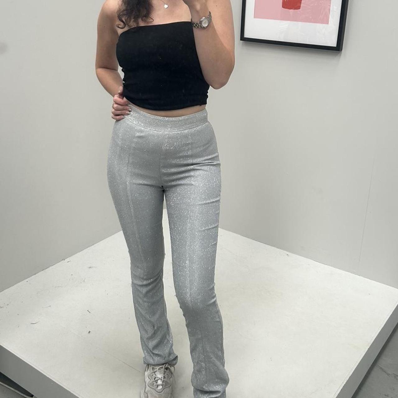 Silver sparkly flare trousers Sample sale Zip at... - Depop