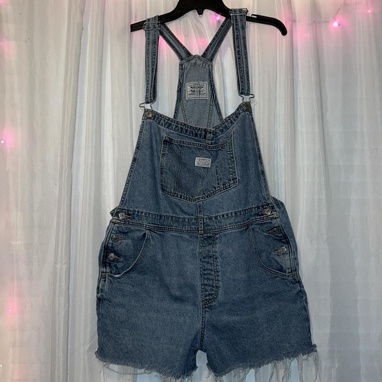 Levi Denim Overall shorts with frayed bottom. Good... - Depop