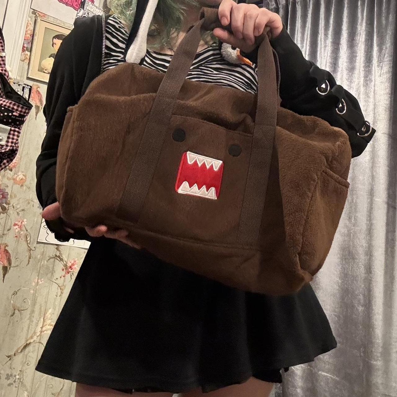 domo duffel bag :3 nwot bottle pockets on both... - Depop