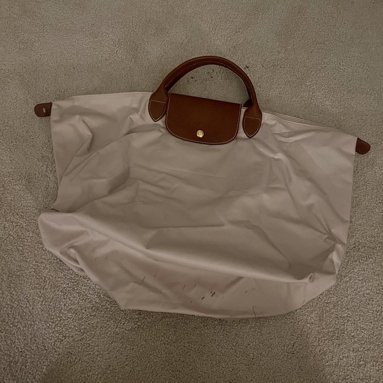 Large longchamp travel bag. A few stains but in... - Depop