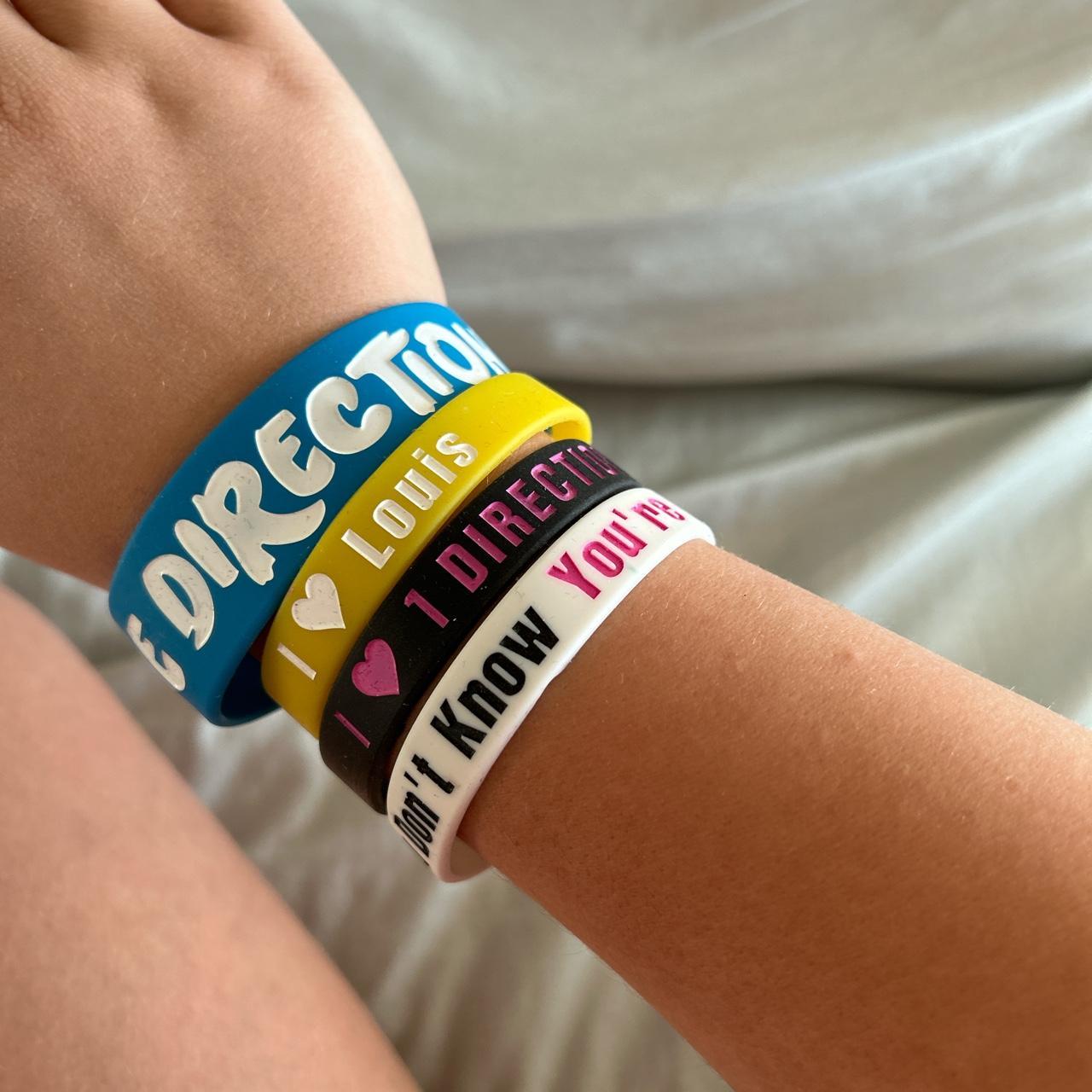 set of one direction bracelets - Depop