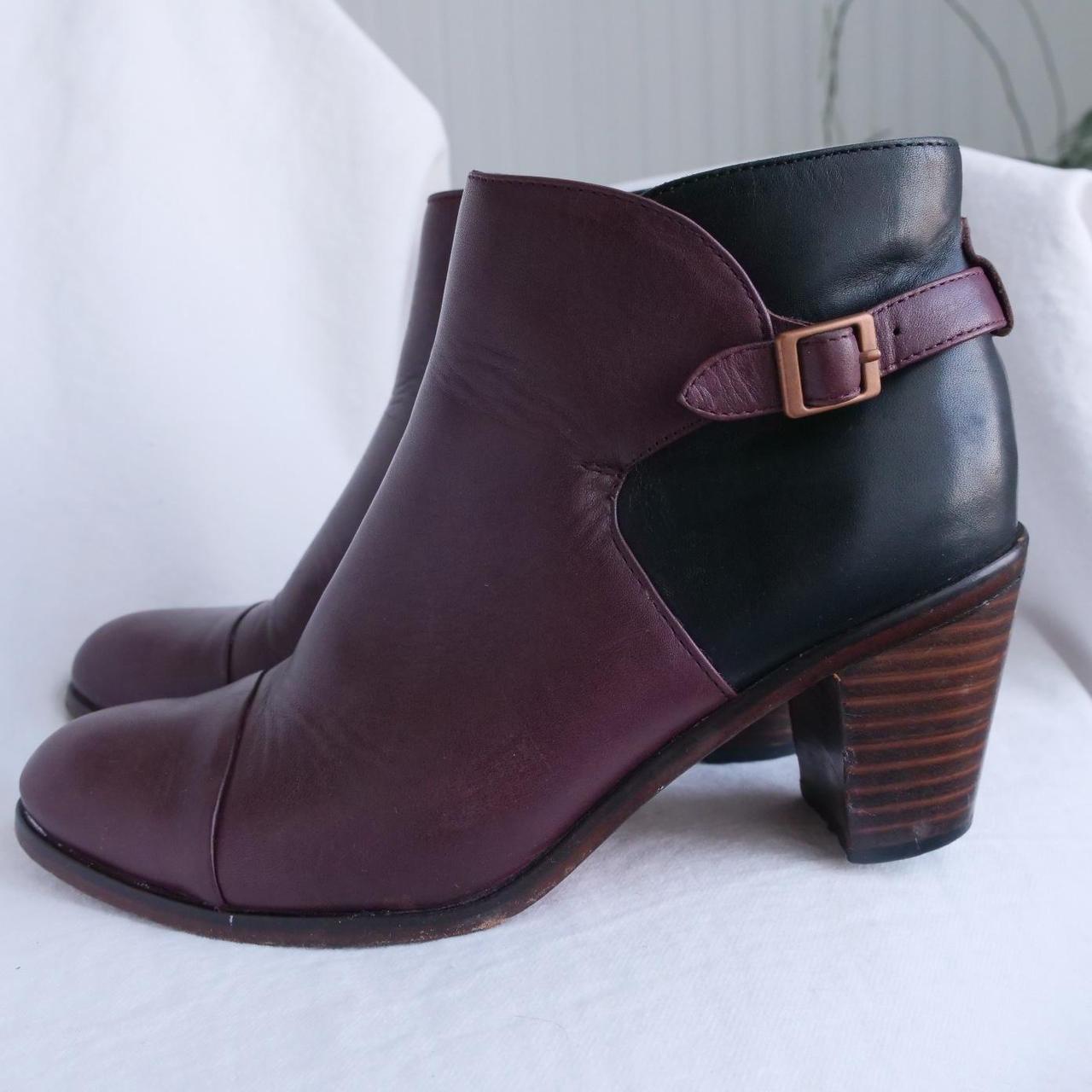 Two toned burgundy and black leather booties By... - Depop