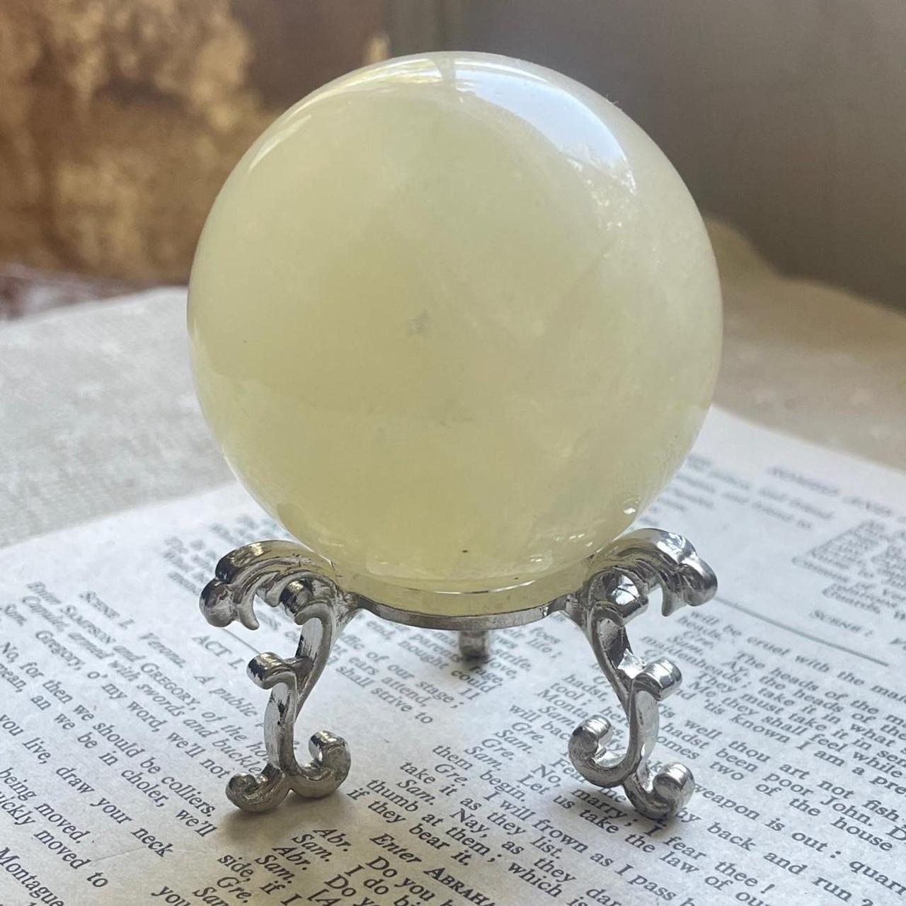 Lovely large yellow calcite sphere which comes with... | Depop