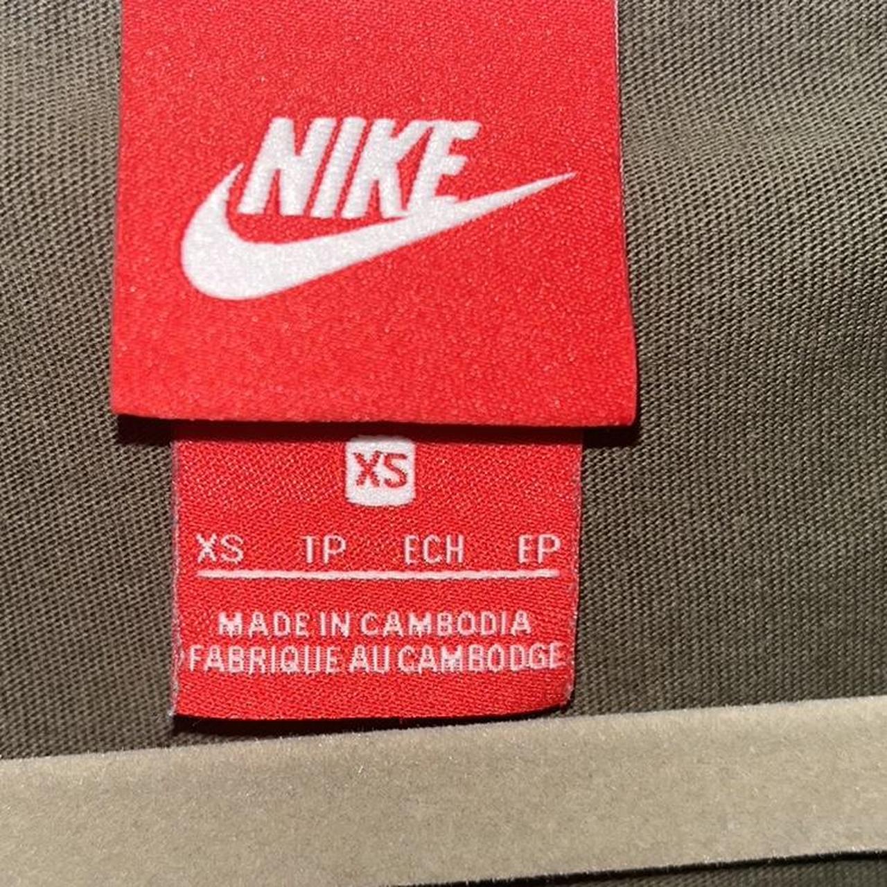 Kaki green cropped nike air t-shirt size xs worn a... - Depop