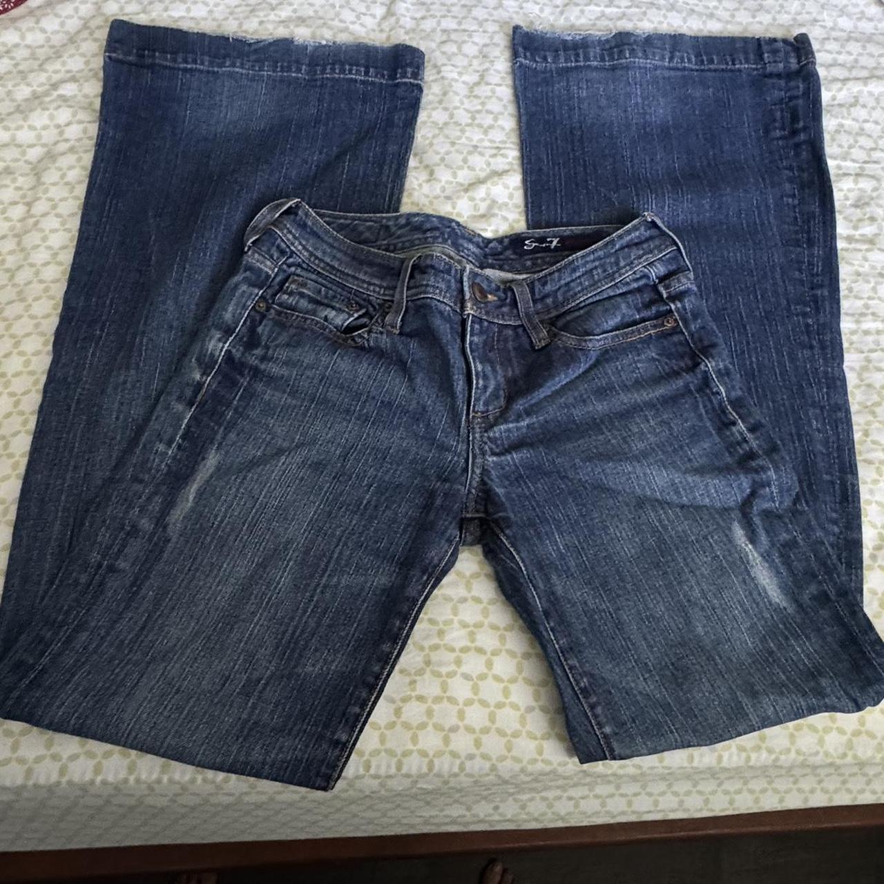 Vintage low rise dark wash flare jeans with frey on... - Depop