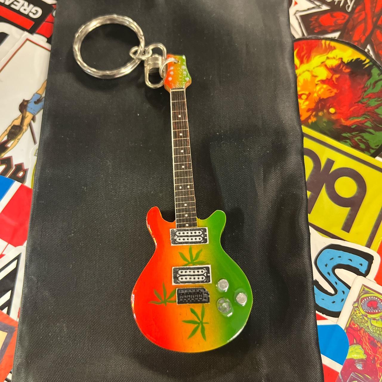 BOB MARLEY GUITAR KEY RING - Depop