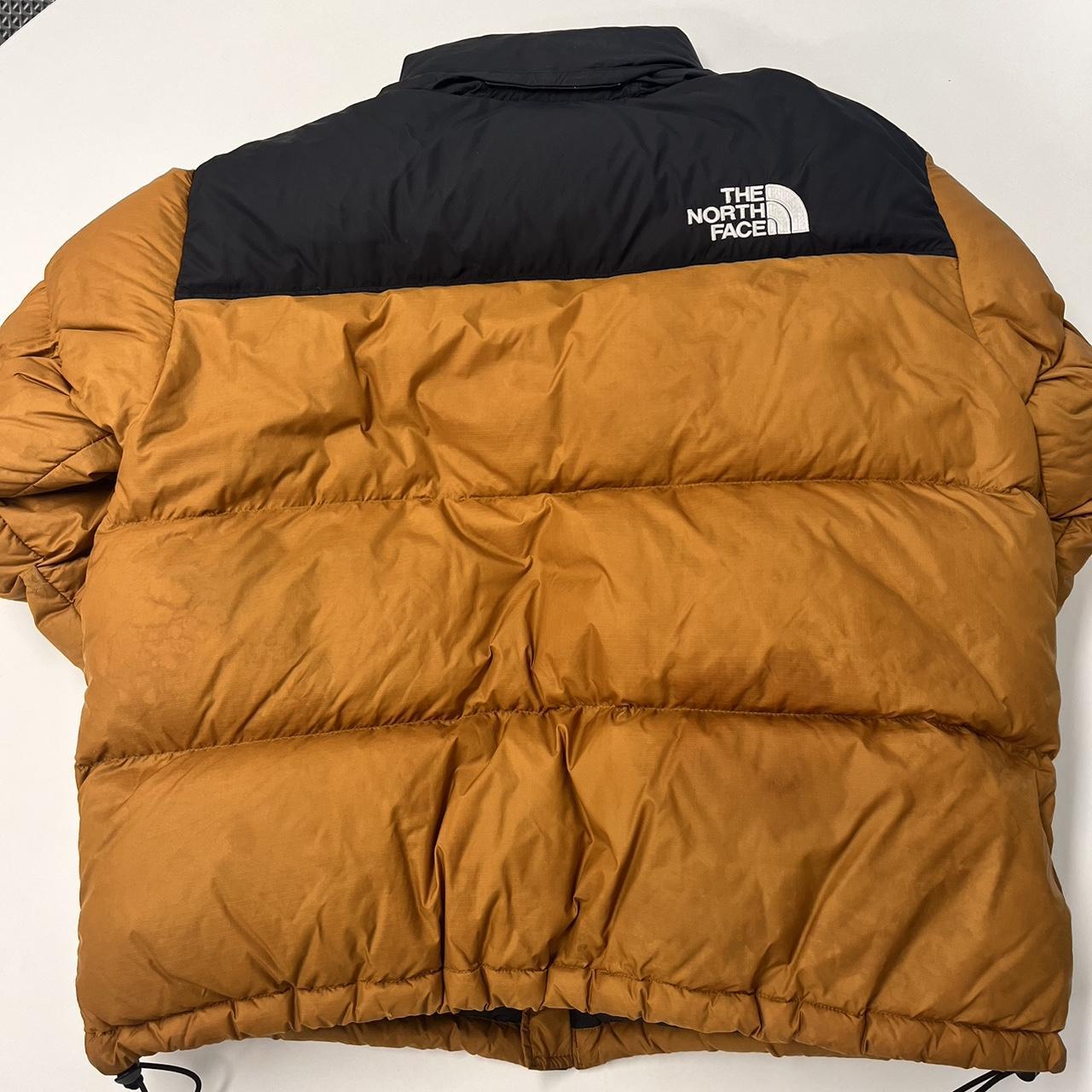 Orange/Brown TNF 700 puffer. Minor signs of wear but... - Depop
