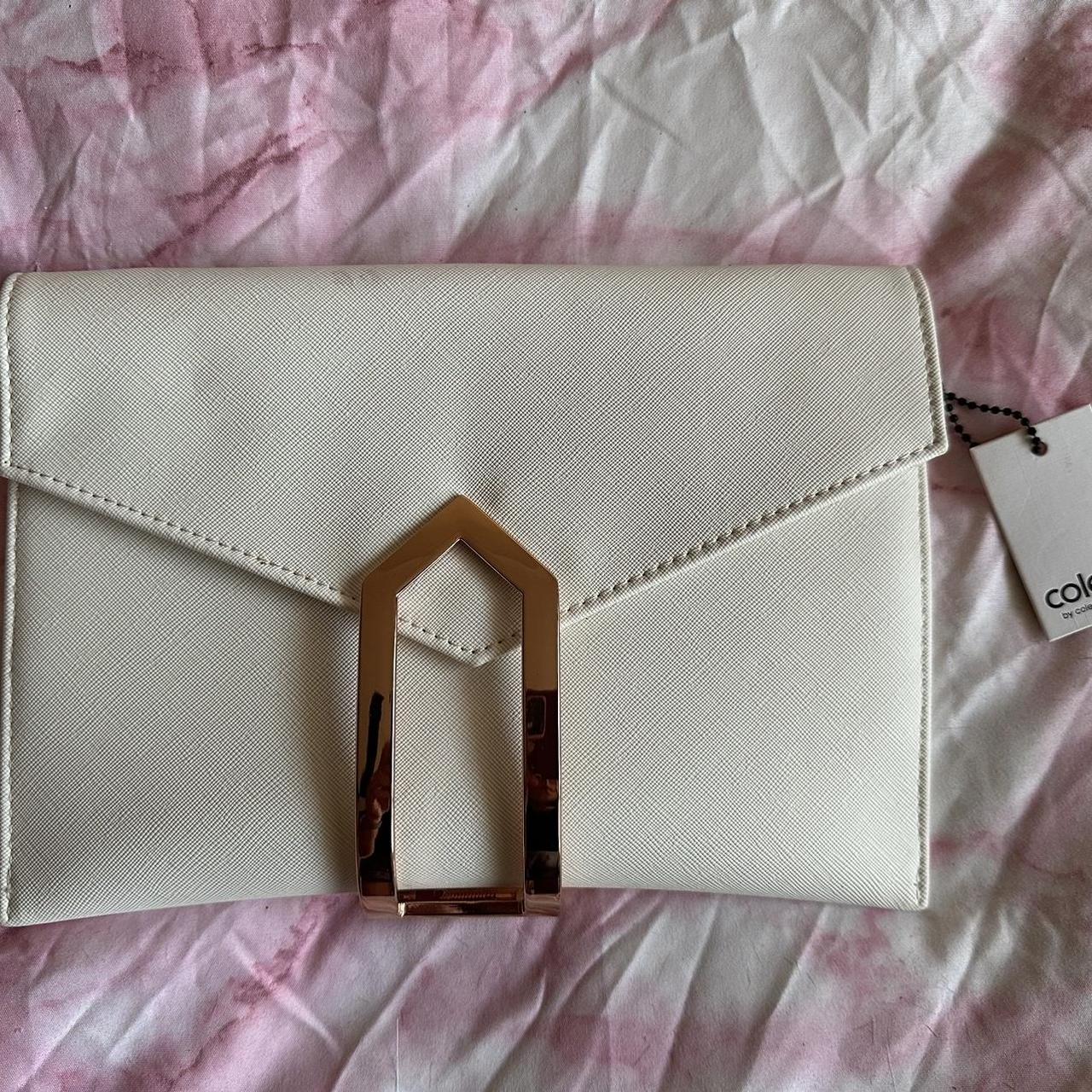 Colette purse new but stained - Depop