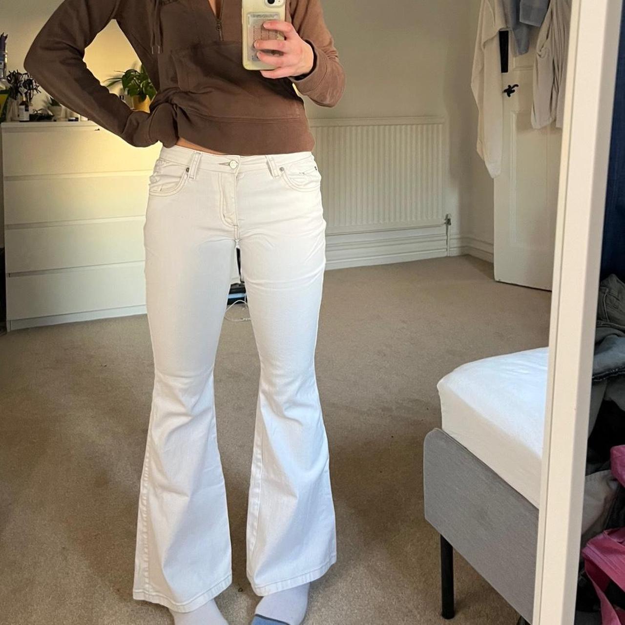 White flare jeans mid rise vintage seen on size 8... - Depop