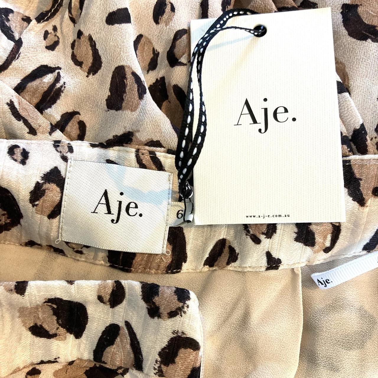 Beautiful skirt from Aje. Brand new midi skirt in... - Depop