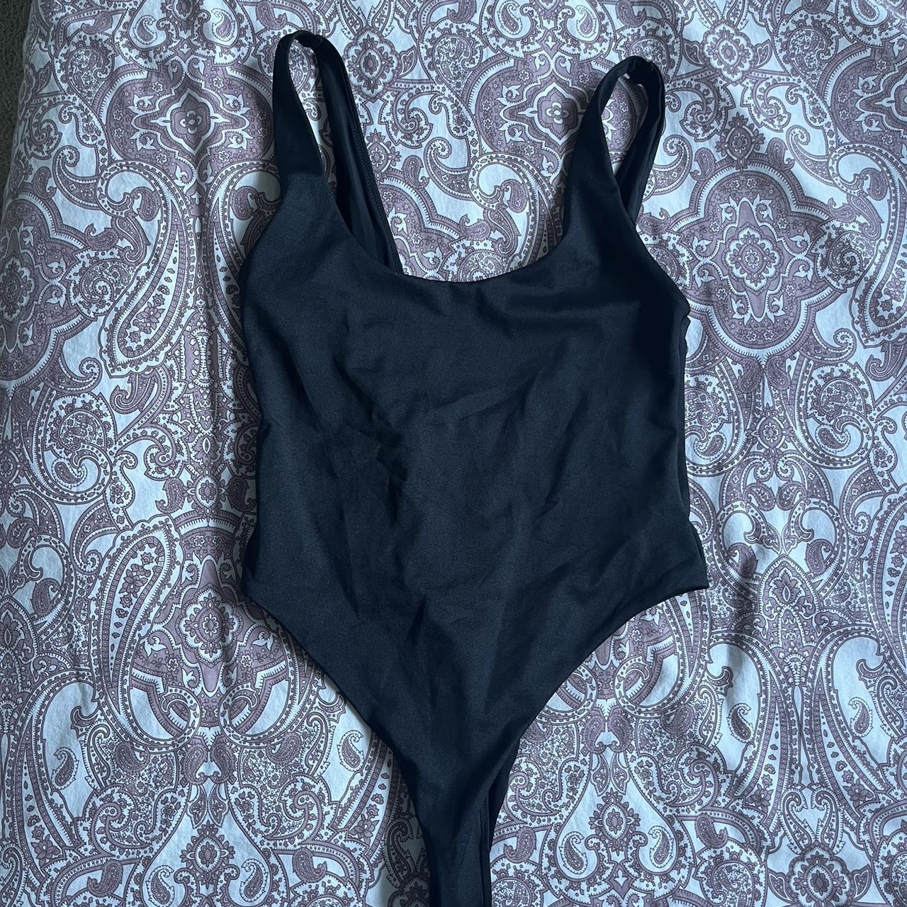 ASOS blackless swimsuit worn once. Would fit a size... - Depop