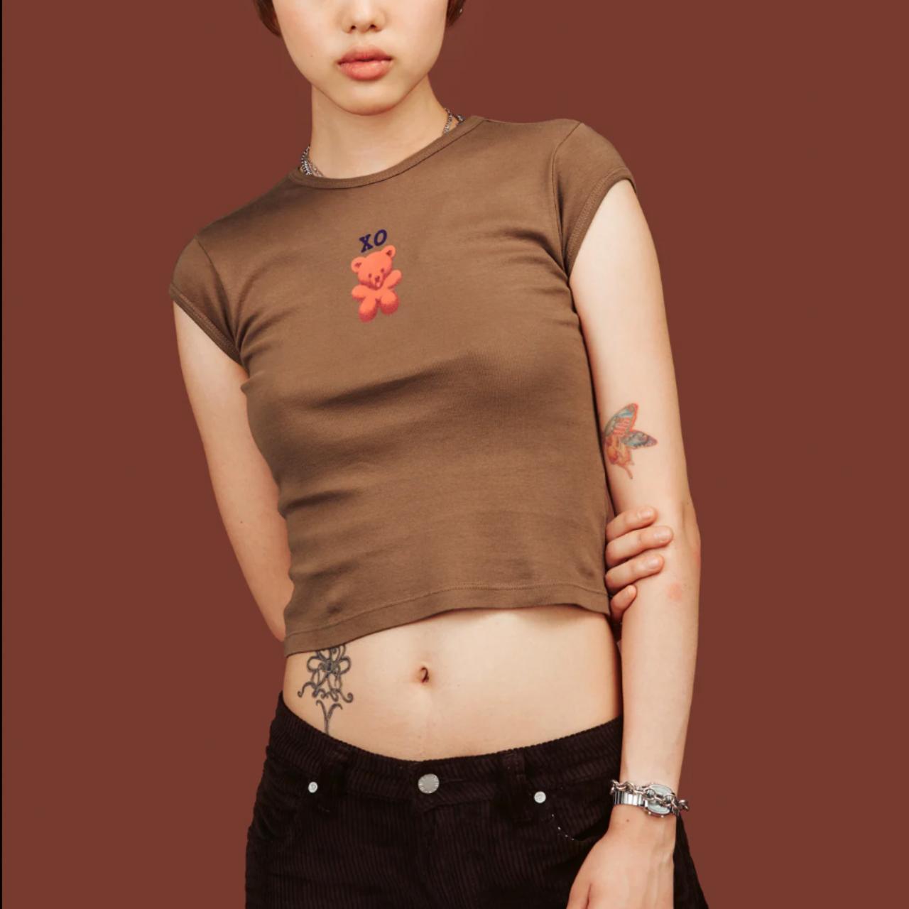 'UNIF' brown baby tee with orange teddy bear XO... - Depop